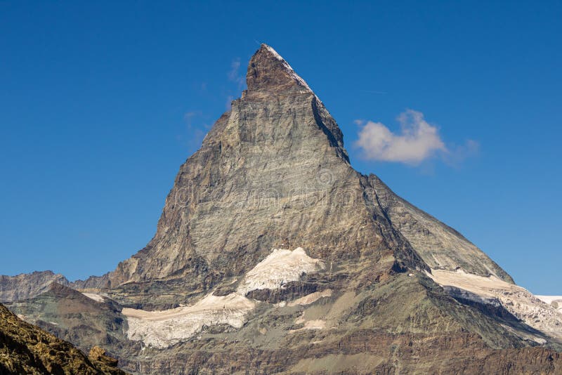 Matterhorn Under the Sunlight and a Blue Sky in Switzerland Stock Photo ...