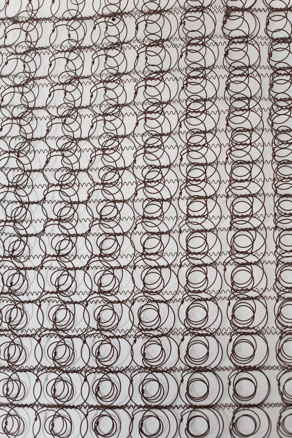 Mattress Spring Wire Left on Green Grass after Fire Stock Image - Image ...