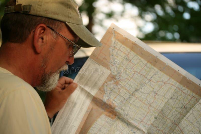 Mature Adult Man Looking at Map Stock Photo - Image of traveling, close ...