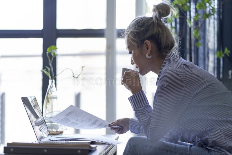 Mature Asian Woman Working from Home Using Notebook Computer Stock ...