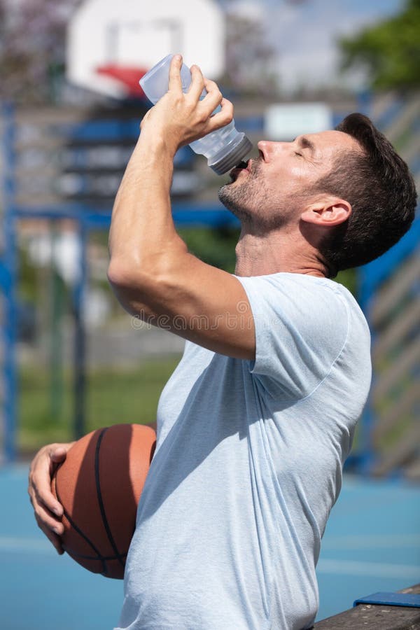 Mature Basketball Player Drinking Water Stock Image - Image of sport ...