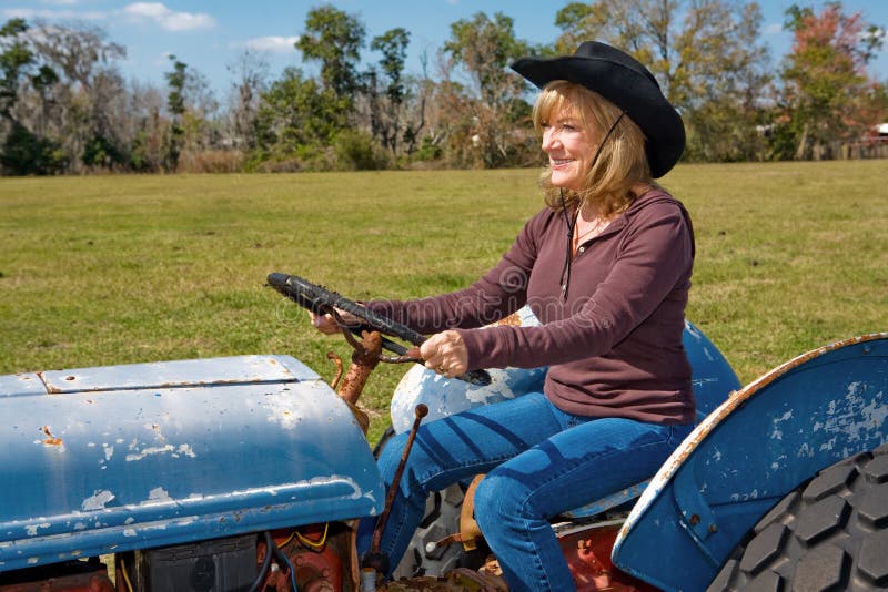 Goth girl on a tractor stock image. Image of grass, goth - 16324561