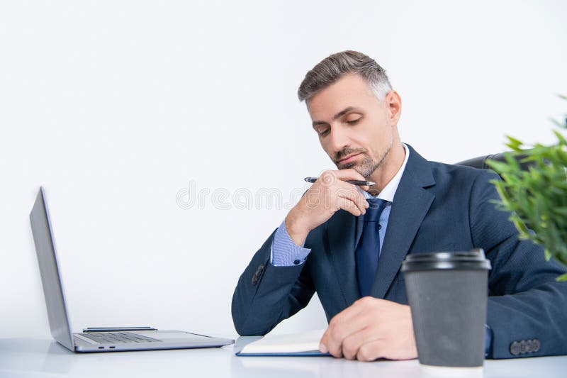 Mature Boss Writing at the Table in Business Office Stock Photo - Image ...