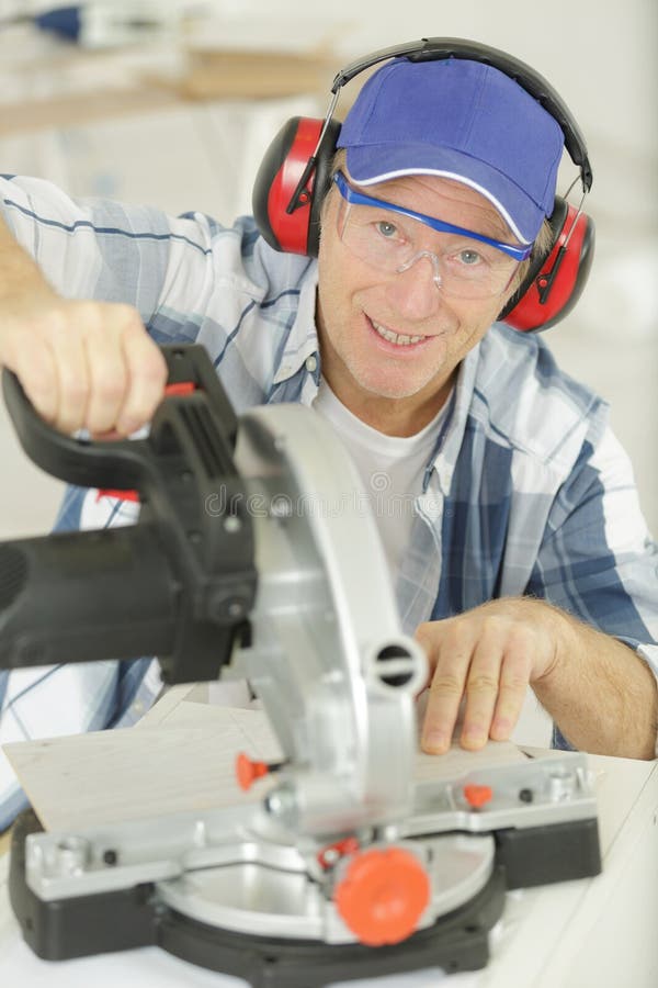 Mature Builder with Circular Saw Stock Image - Image of renovation ...