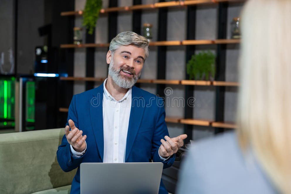 Mature Business Man Having an Interview with a Work Candidate and ...