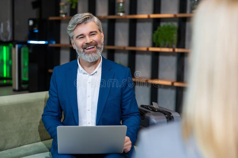 Mature Business Man Having an Interview with a Work Candidate and ...