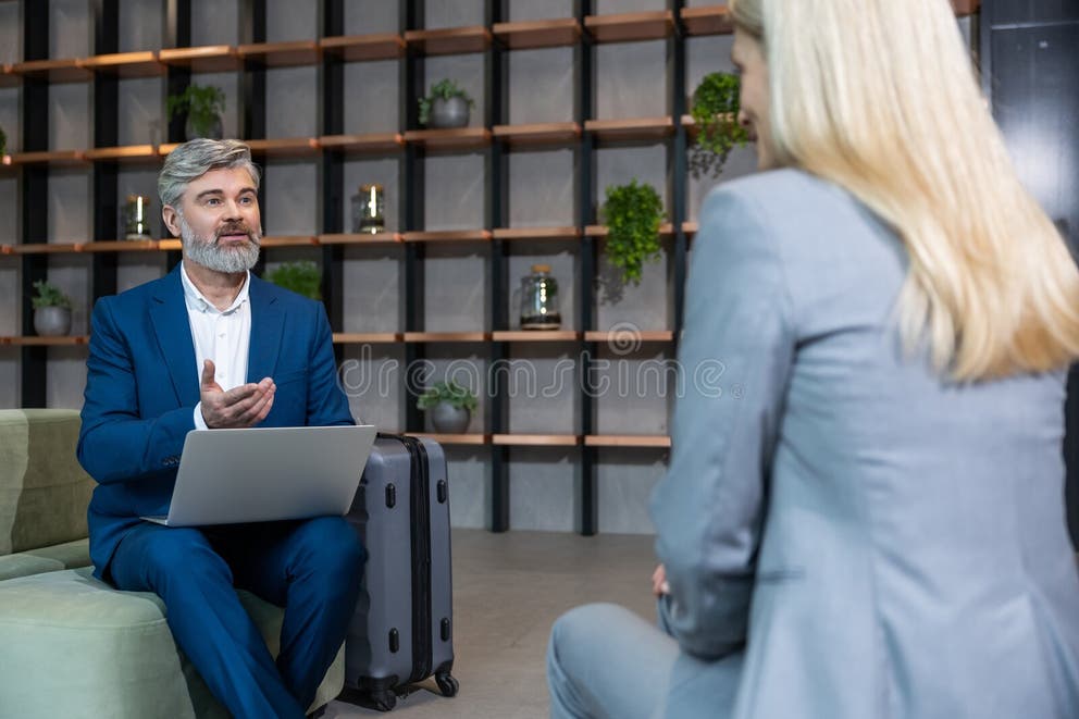 Mature Business Man Having an Interview with a Work Candidate and ...