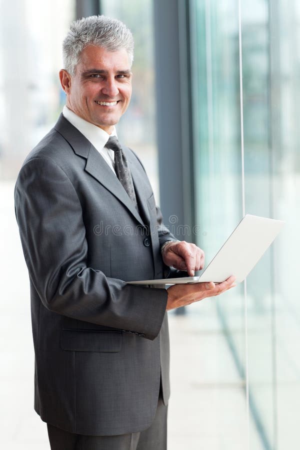Mature Businessman Computer Stock Photo - Image of cheerful, computer ...