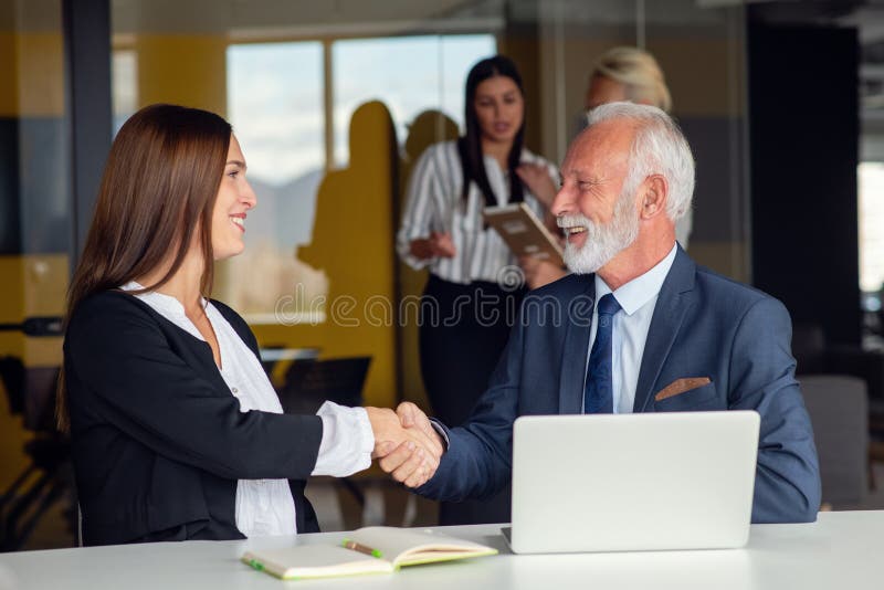 Mature Businessman Leader Mentor Talking To Diverse Colleagues Team ... Mature Businessman Leader Mentor Talking To Diverse Colleagues Team ...