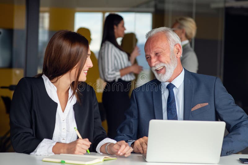 Mature Businessman Leader Mentor Talking To Diverse Colleagues Team ... Mature Businessman Leader Mentor Talking To Diverse Colleagues Team ...