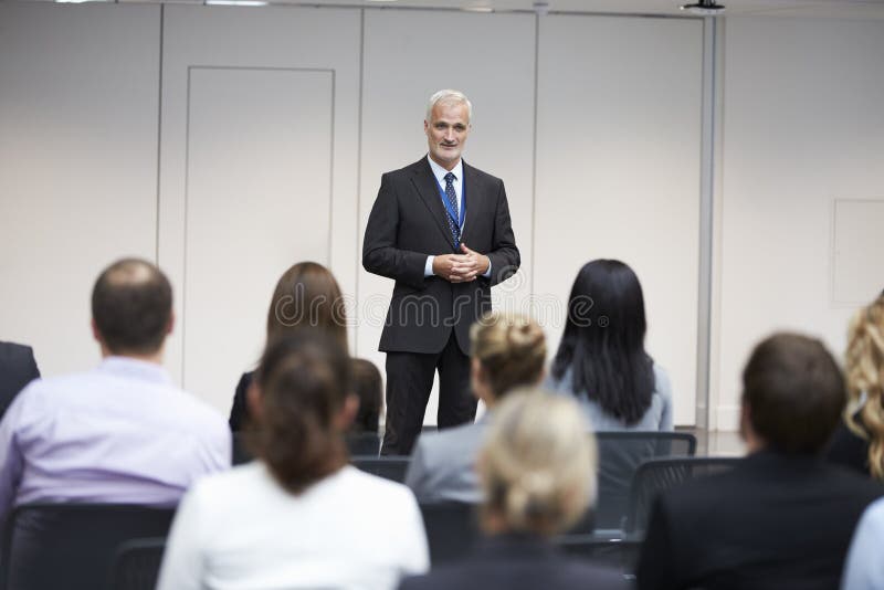 Mature Businessman Making Presentation at Conference Stock Photo ...
