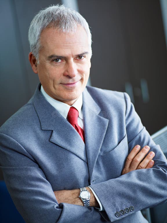 Mature Businessman in Office Stock Photo - Image of camera, happy: 12732268