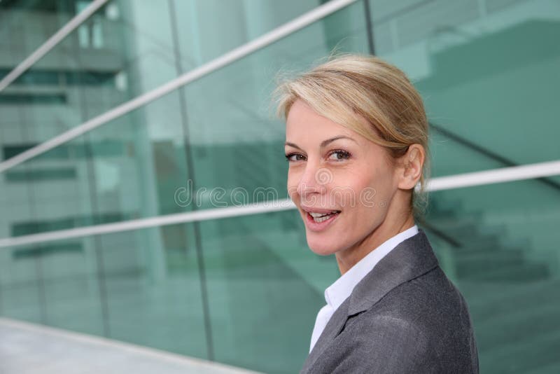 Mature Businesswoman Standing in Hallway Stock Photo - Image of ... Mature Businesswoman Standing in Hallway Stock Photo - Image of ...