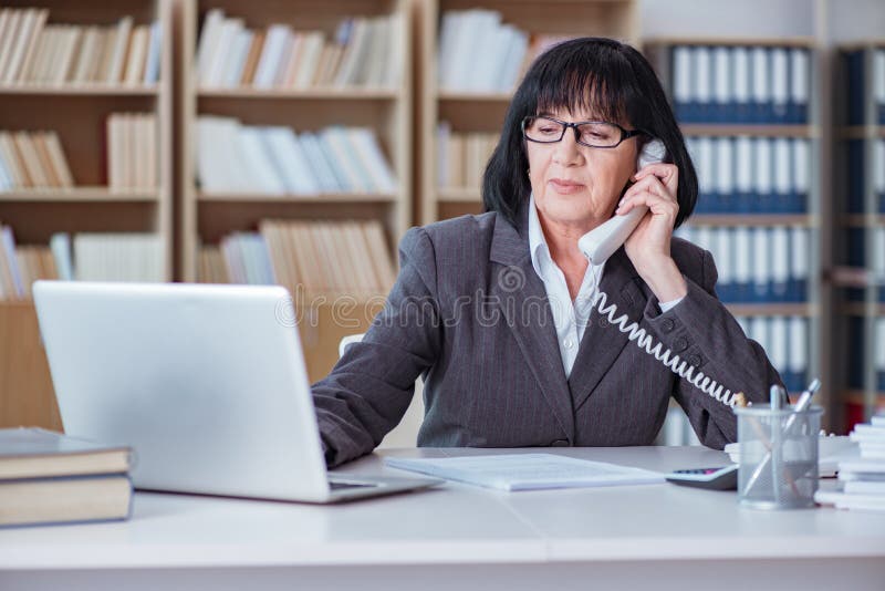 The Mature Businesswoman Working in the Office Stock Photo - Image of ...