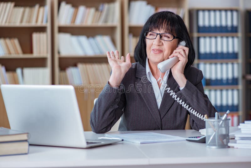 The Mature Businesswoman Working in the Office Stock Image - Image of ...