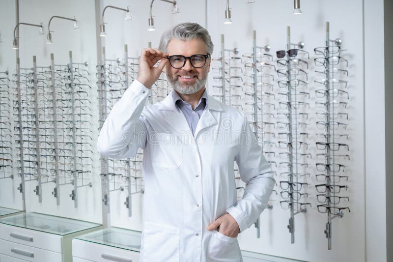 Mature Caucasian Man in Lab Coat and Glasses Looking Determined Stock ...