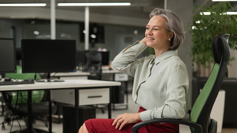 Mature Caucasian Woman at the Desk in the Office. Stock Image - Image ...