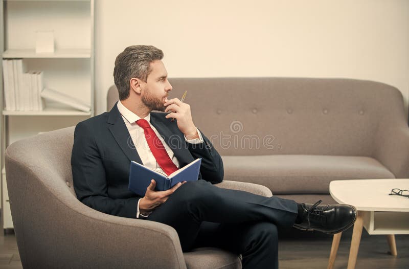 Mature Ceo in Suit Sit in Office Making Notes in Notebook Stock Photo ...