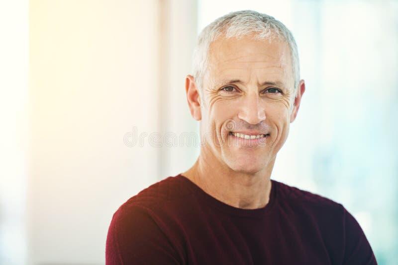 Mature Confidence. Portrait of a Smiling Mature Man Standing in His ... Mature Confidence. Portrait of a Smiling Mature Man Standing in His ...
