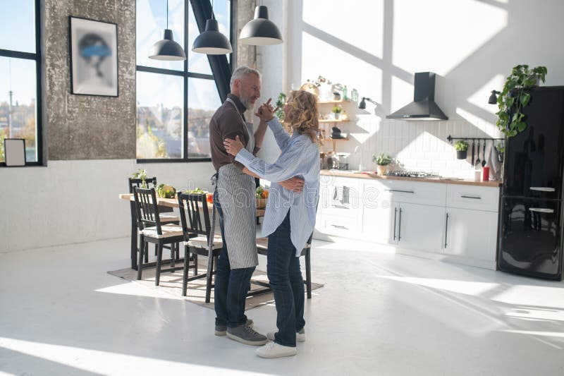 A Mature Couple Dancing in the Kitchen Stock Image - Image of couple ...