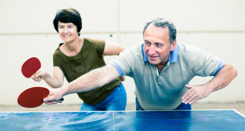 Mature Couple Playing Ping Pong Stock Image - Image of human, pair ...