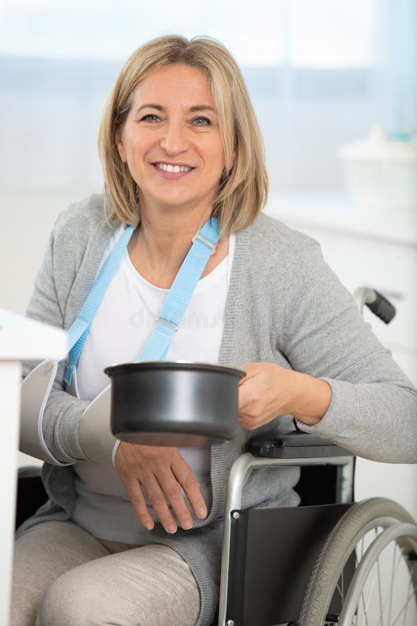 Mature Disabled Woman Cooking Meal Stock Image - Image of caucasian ...