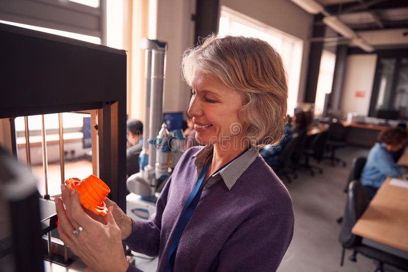 Mature Female College Student Studying Engineering Using 3D Printing ...