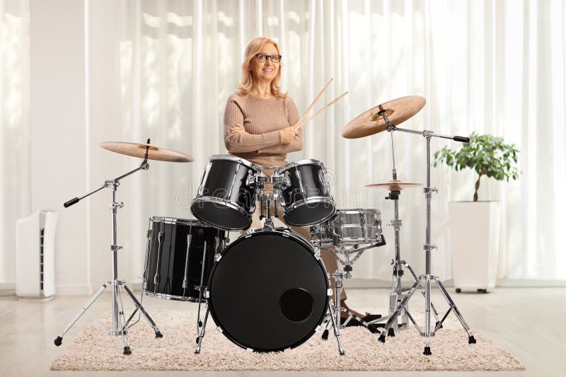 Mature Female Drummer Posing with a Drum Set Stock Photo - Image of music, percussion: 300463758