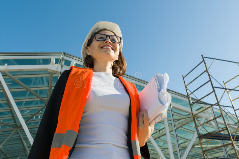 Mature Female Engineer on Construction Site. Building, Development ...