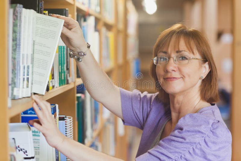 Librarian Reaching for a Book Stock Image - Image of librarian, panties ...