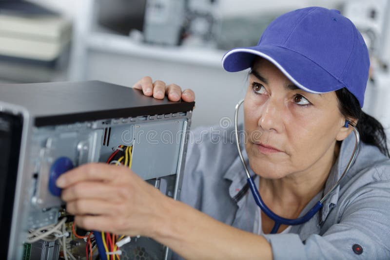 Mature Female Pc Technician Checking Pc Parts Stock Photo - Image of ...