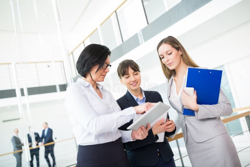 Professional Explaining Project To Colleagues on Digital Tablet Stock ...