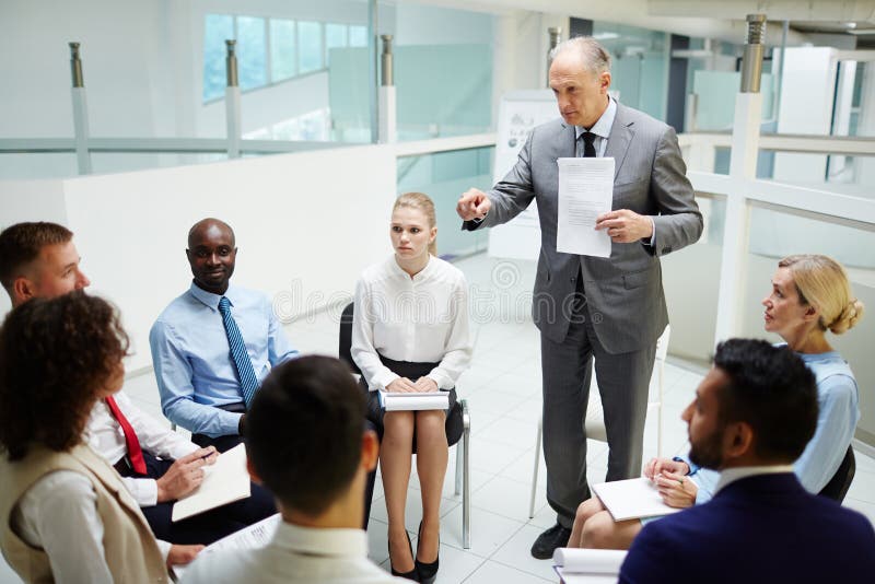 Explaining data stock image. Image of intercultural - 104602761