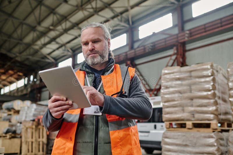 Foreman Using Tablet Pc in Warehouse Stock Image - Image of cargo ...