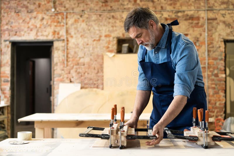 Joiner at work stock photo. Image of equipment, sawdust - 67900426