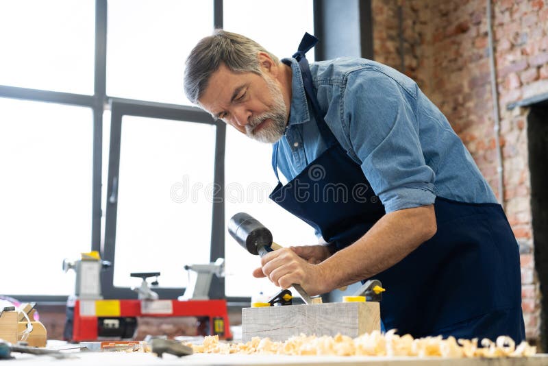 Joiner at work stock photo. Image of equipment, sawdust - 67900426