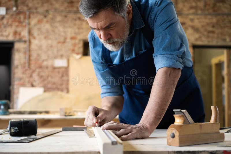 Joiner at work stock photo. Image of equipment, sawdust - 67900426
