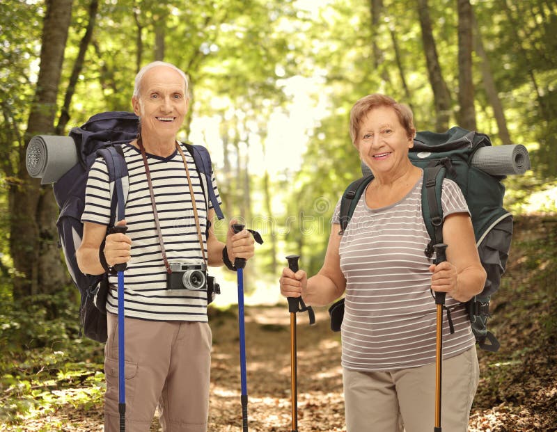 Mature Hikers Posing with Hiking Poles Stock Photo - Image of lady ...