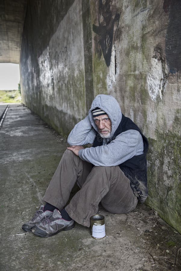 Mature Homeless Man Sitting Outdoors with a Tin Stock Image - Image of ...