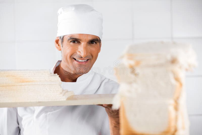 Mature Male Baker Bread Slices Stock Photos - Free & Royalty-Free Stock ...