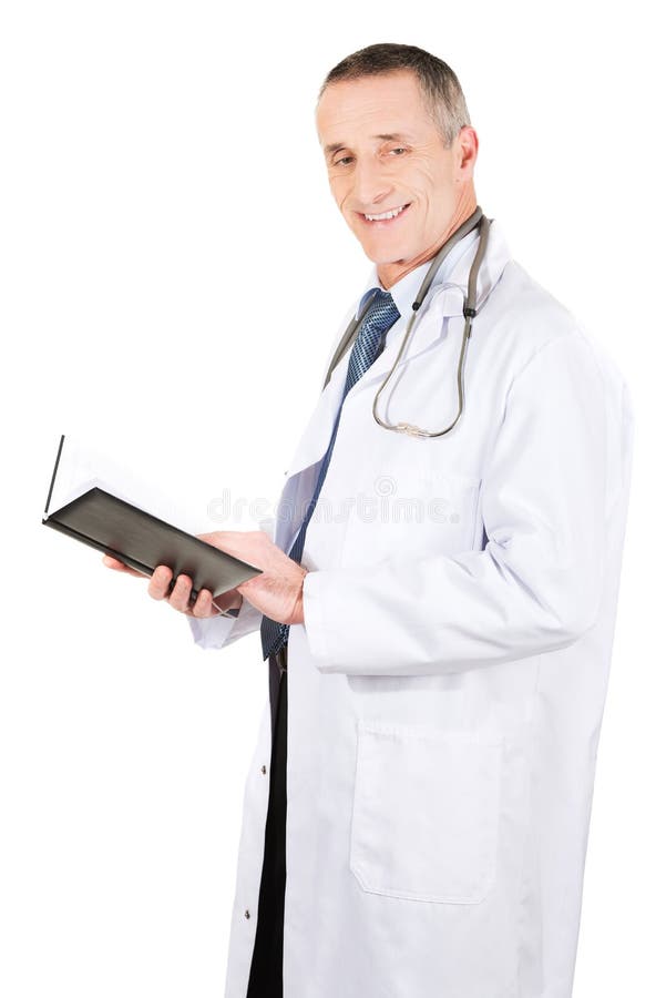 Mature Male Doctor Holding Notebook Stock Image - Image of notes ...