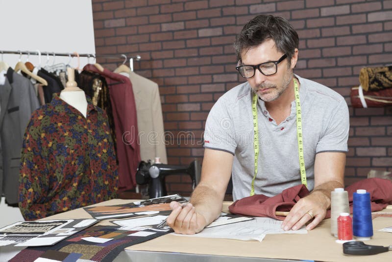 Mature Male Fashion Designer Working in Design Studio Stock Photo ...