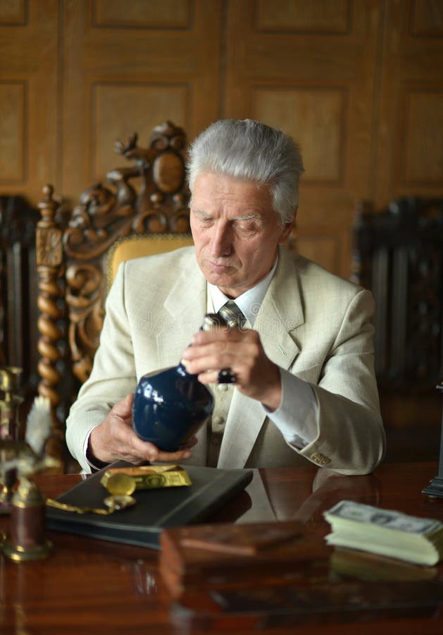 Mature male mafia boss stock image. Image of clock, face - 79438423