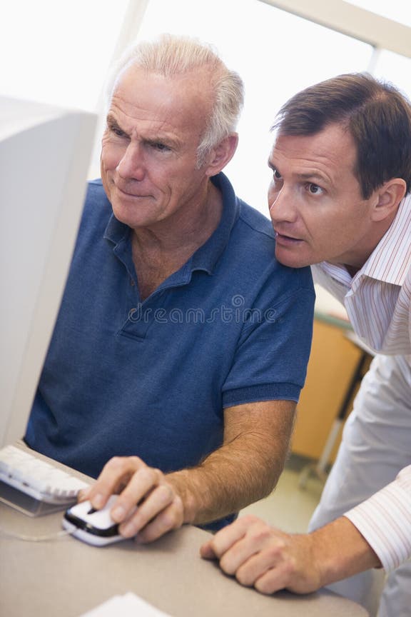 Mature Male Student Learning Computer Skills Stock Photo - Image of ...