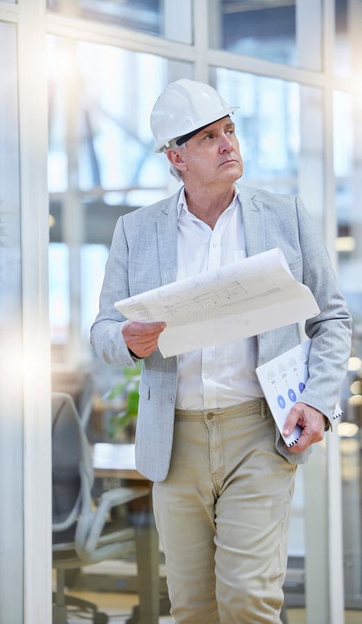 Mature Man, Blueprint and Construction Manager Walking in Building Site ...