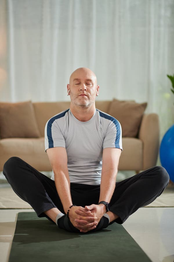 Man Doing Butterfly Stretch Stock Image - Image of male, mature: 263851569