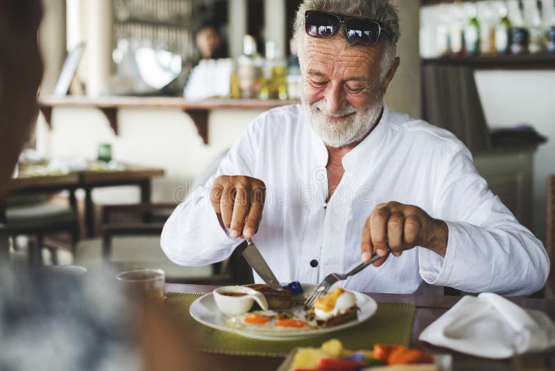 Mature Man Eating Breakfast at Hotel Stock Image - Image of brunch ...