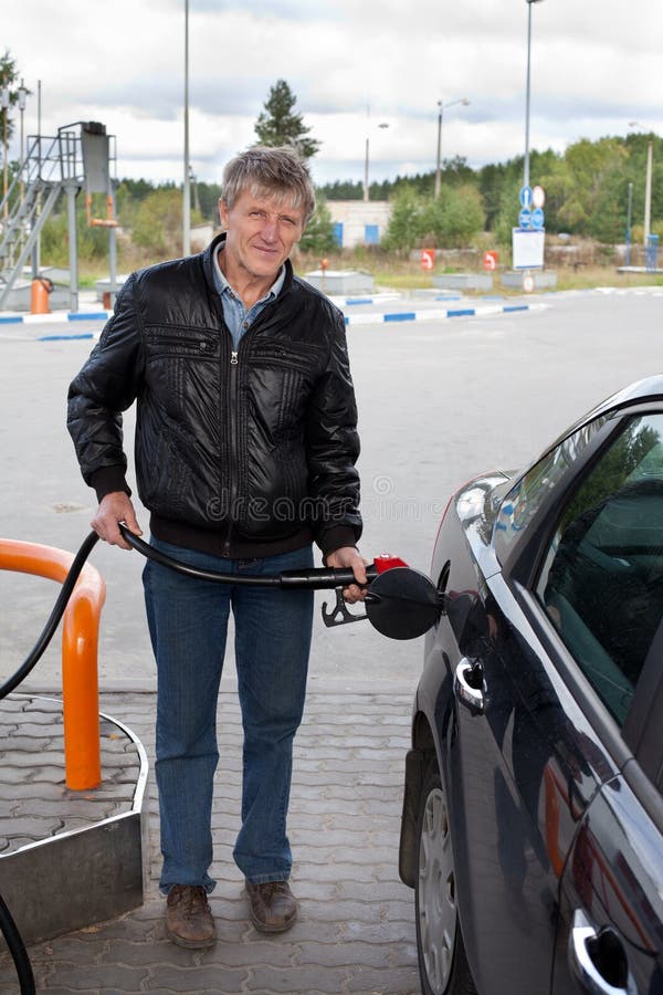 Mature Man Filling Car with Gasoline in Stock Image - Image of petrol ...