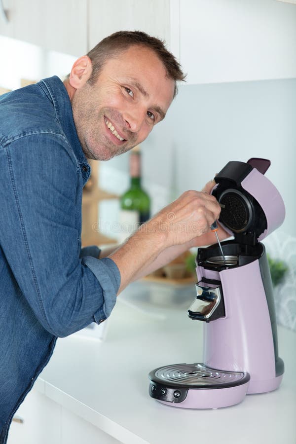Mature Man Fixing Coffee Machine Stock Photo - Image of appliance ...