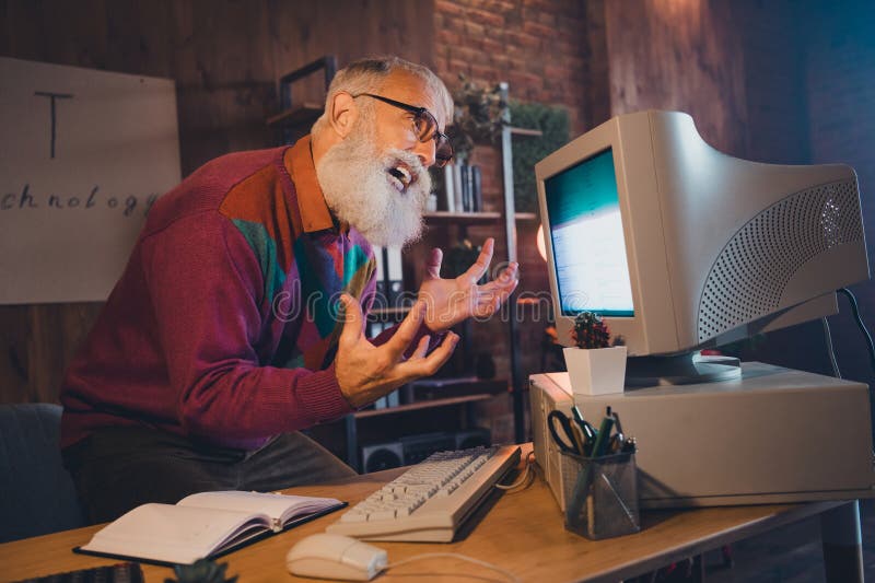 Senior Man Frustrated with Outdated Computer Technology in Office ...